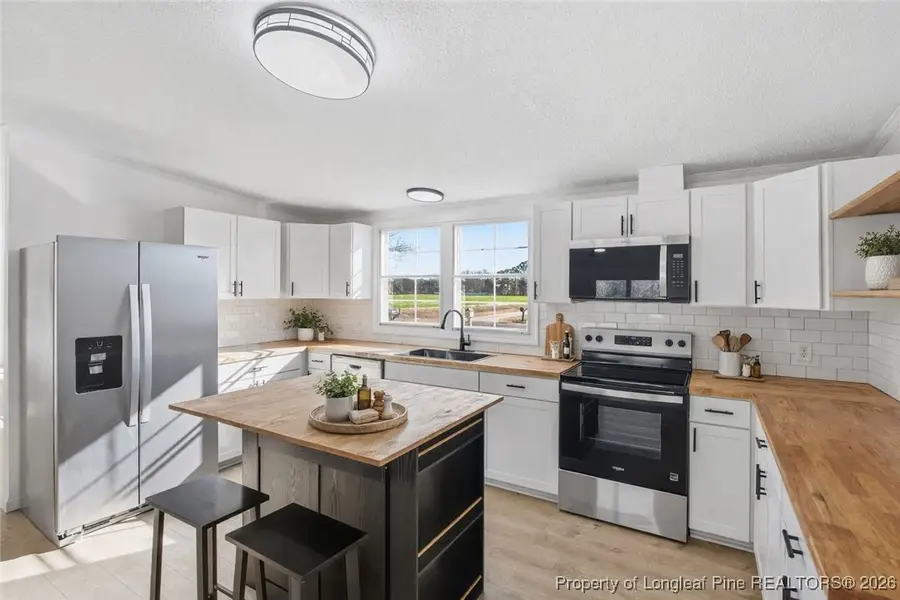 6729 Tennis Drive, Stedman, NC 28391 | The Joy of Home, CENTURY 21